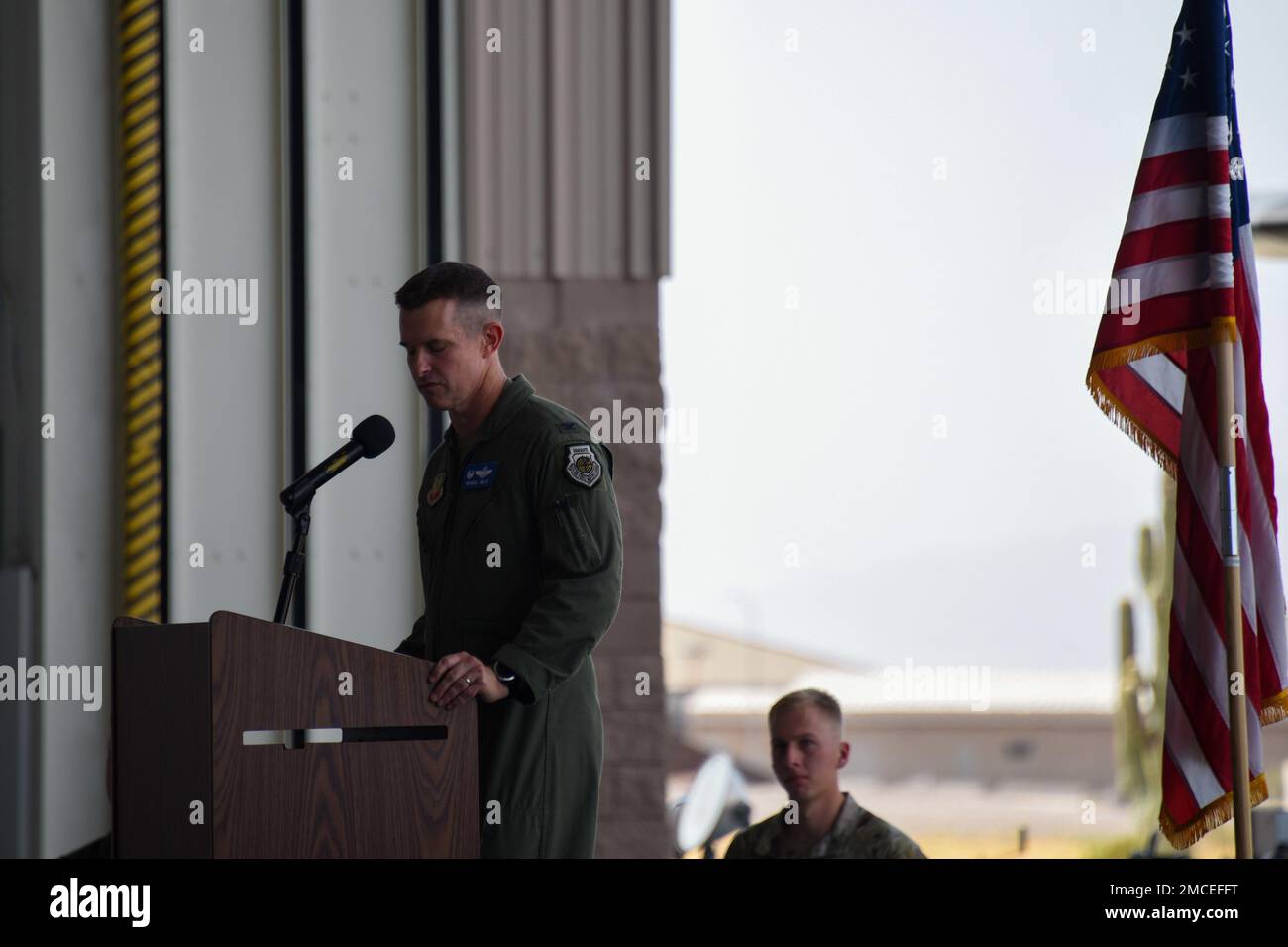 U.S. Air Force Col. Scott Mills, delivers a speech during a change of ...