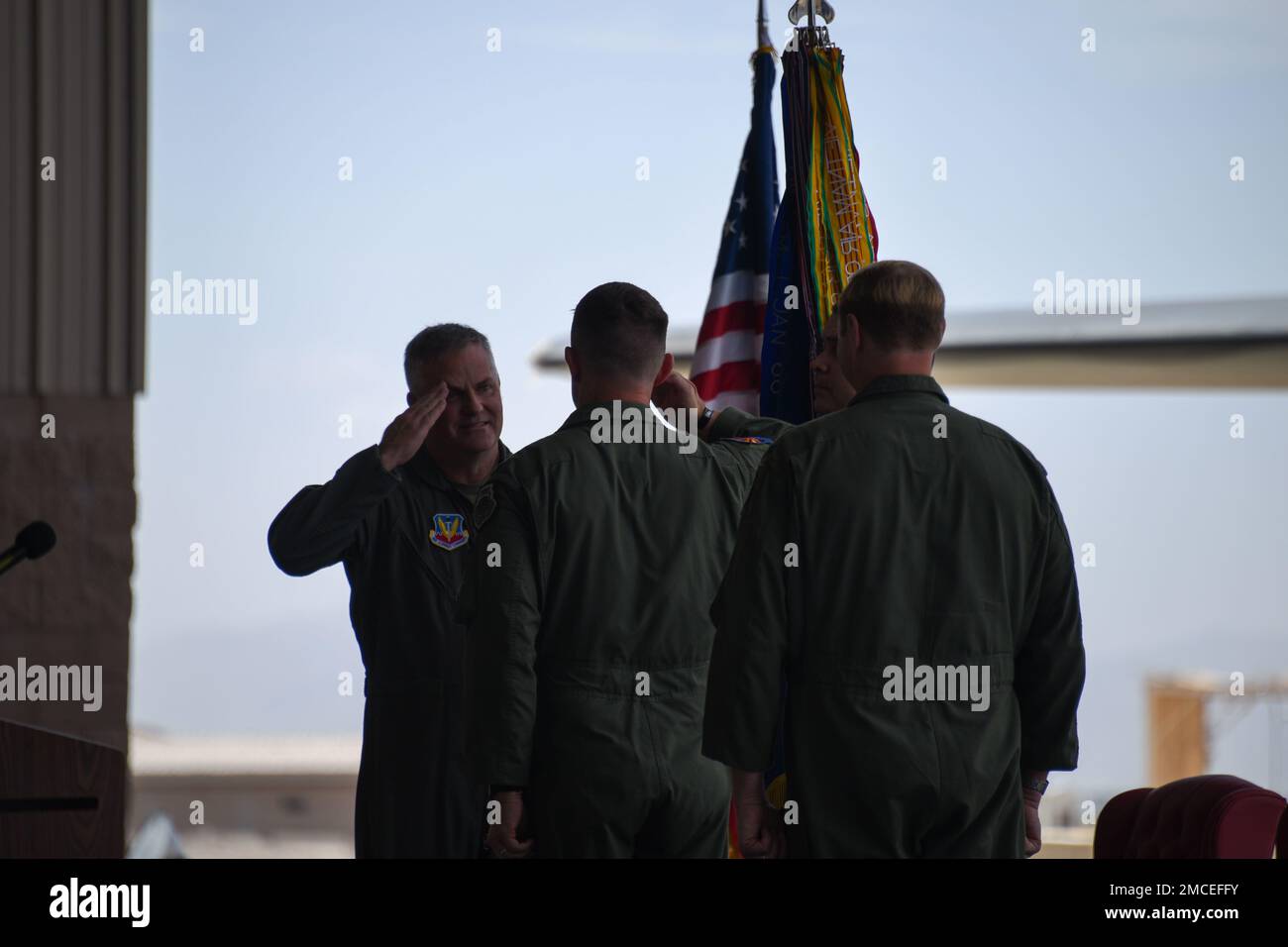 U.S. Air Force Col. Scott Mills, incoming 355th Wing commander, renders ...