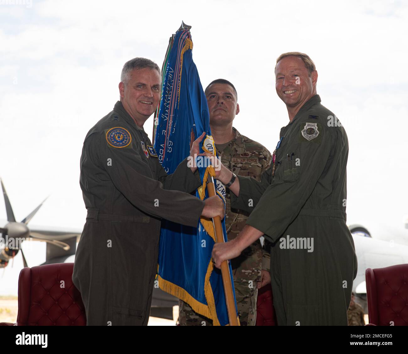 U.S. Air Force Col. Joseph Turnham, 355th Wing commander, presents Maj ...