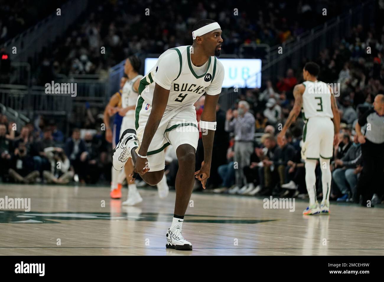 Milwaukee Bucks' Bobby Portis reacts after making a three-point basket ...