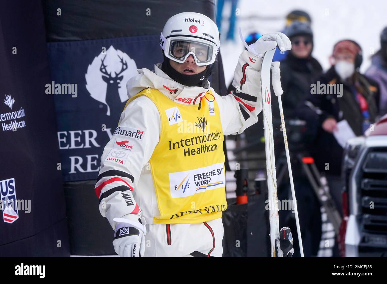 Canada's Mikael Kingsbury holds his skis after a run in the finals of a ...