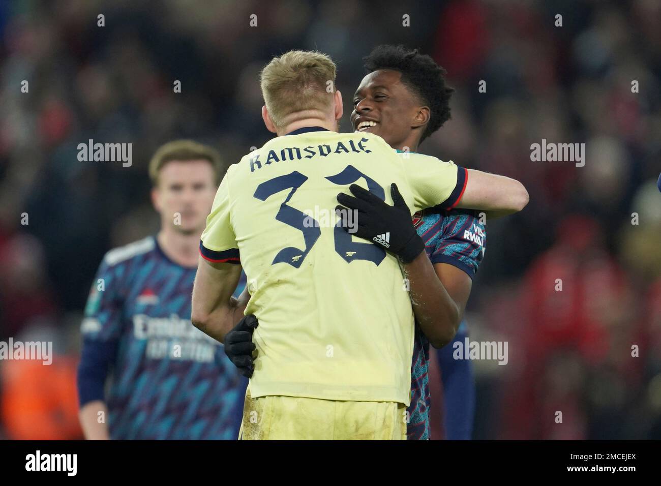 Arsenal's goalkeeper Aaron Ramsdale gets a hug from Arsenal's Albert ...