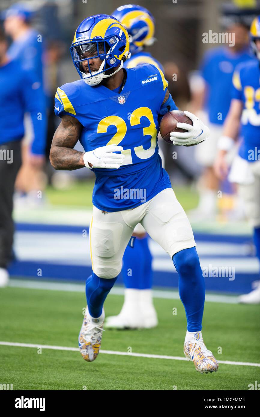 Los Angeles Rams running back Cam Akers (23) runs with the ball before ...