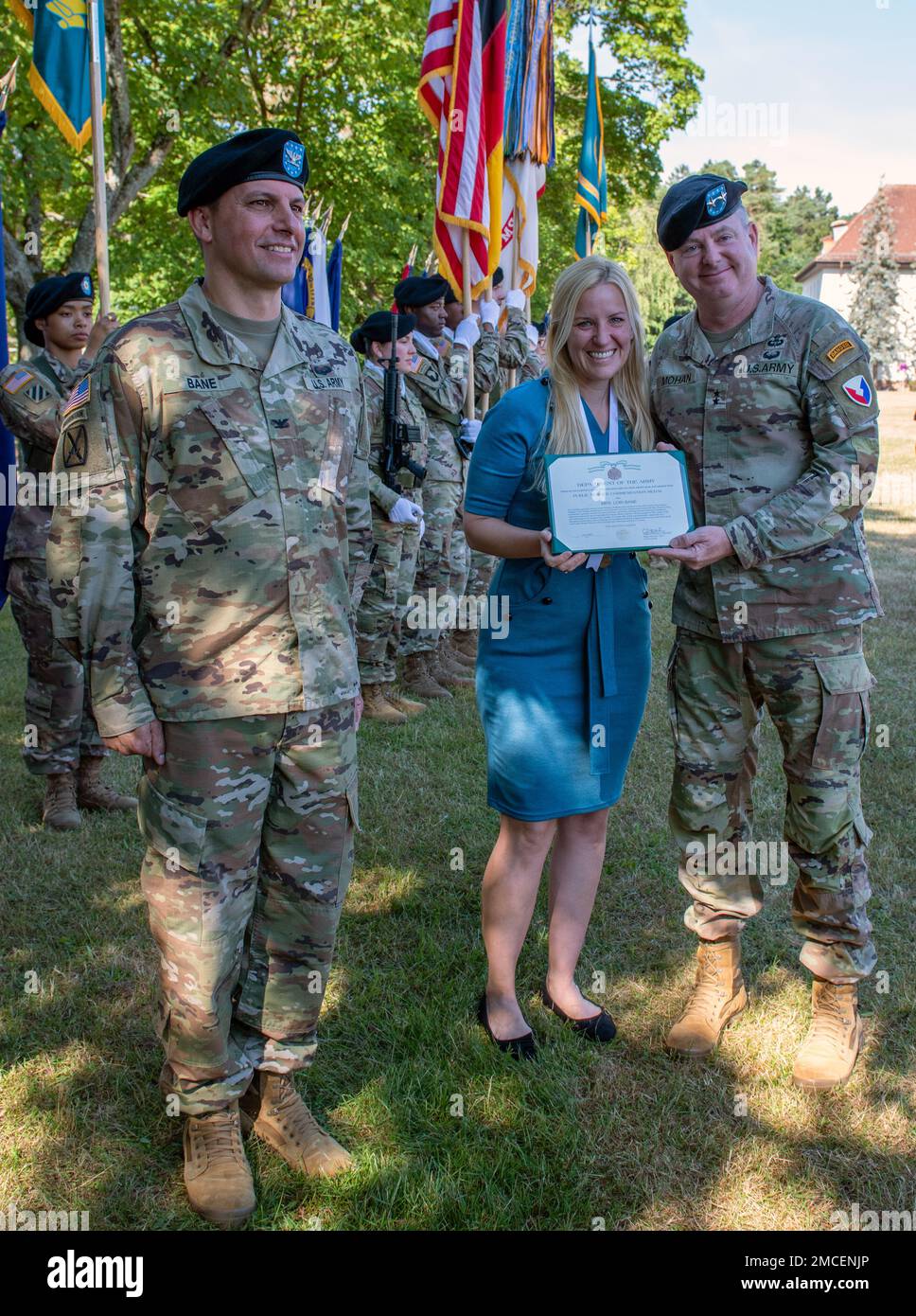 Lori Bane receives a Public Service Commendation Medal from Maj. Gen ...