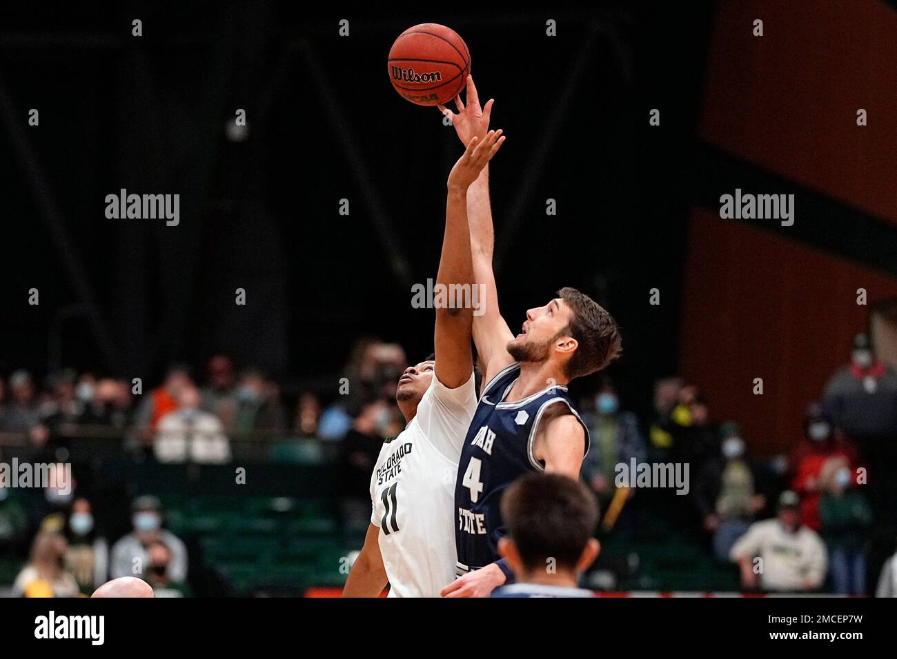 Utah State forward Brandon Horvath (4) tips off against Colorado State ...
