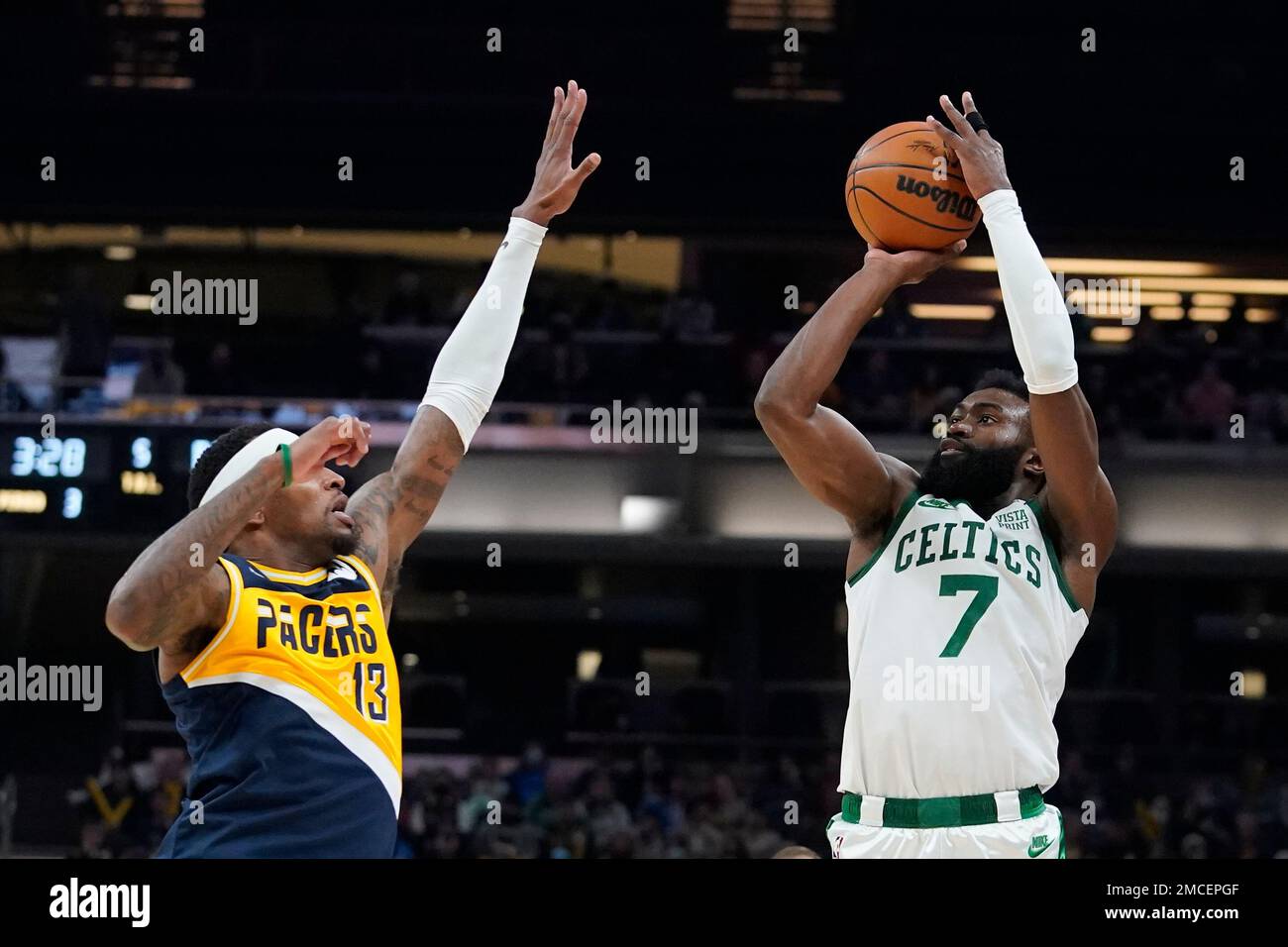 Boston Celtics guard Jaylen Brown (7) shoots over Indiana Pacers ...