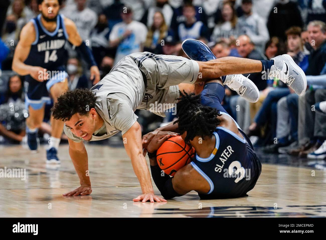 Villanova's Brandon Slater (3) and Xavier's Colby Jones fight for a ...