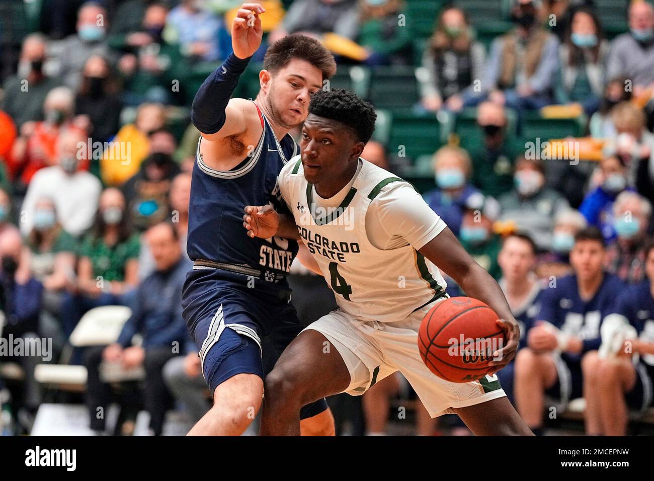 Colorado State guard Isaiah Stevens (4) bumps Utah State guard Rylan ...