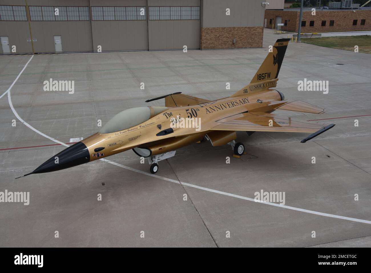 A gold U.S. Air Force F-16A Falcon from the Iowa Air National Guard is ...