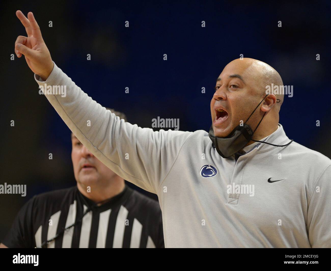 Penn State coach Micah Shrewsberry gives instructions to his team ...