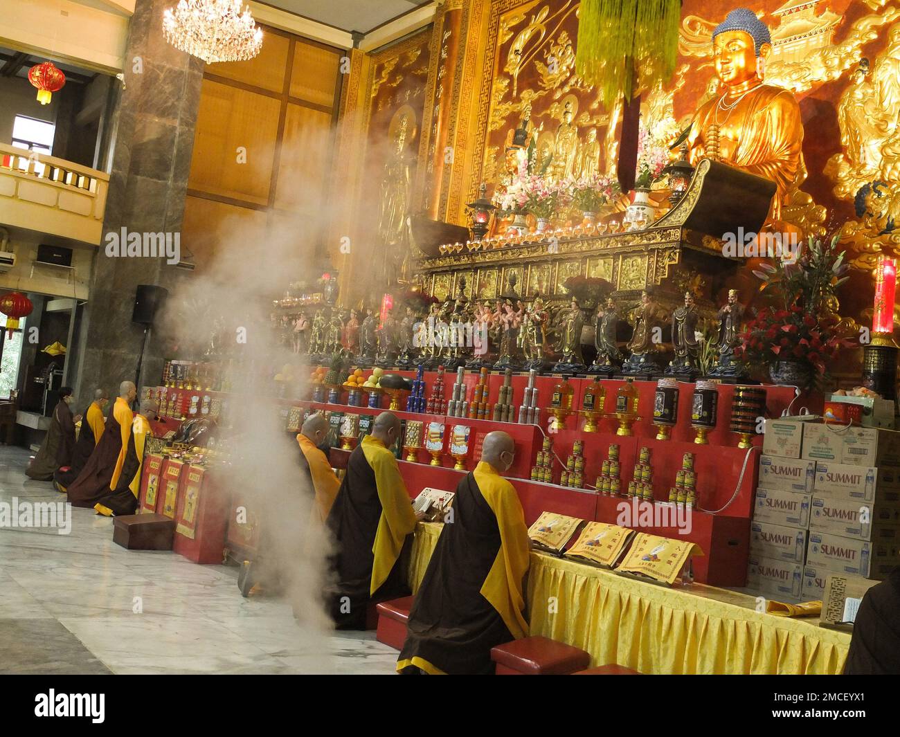 Buddhist monks make rituals in front of Buddha statues at Seng Guan ...