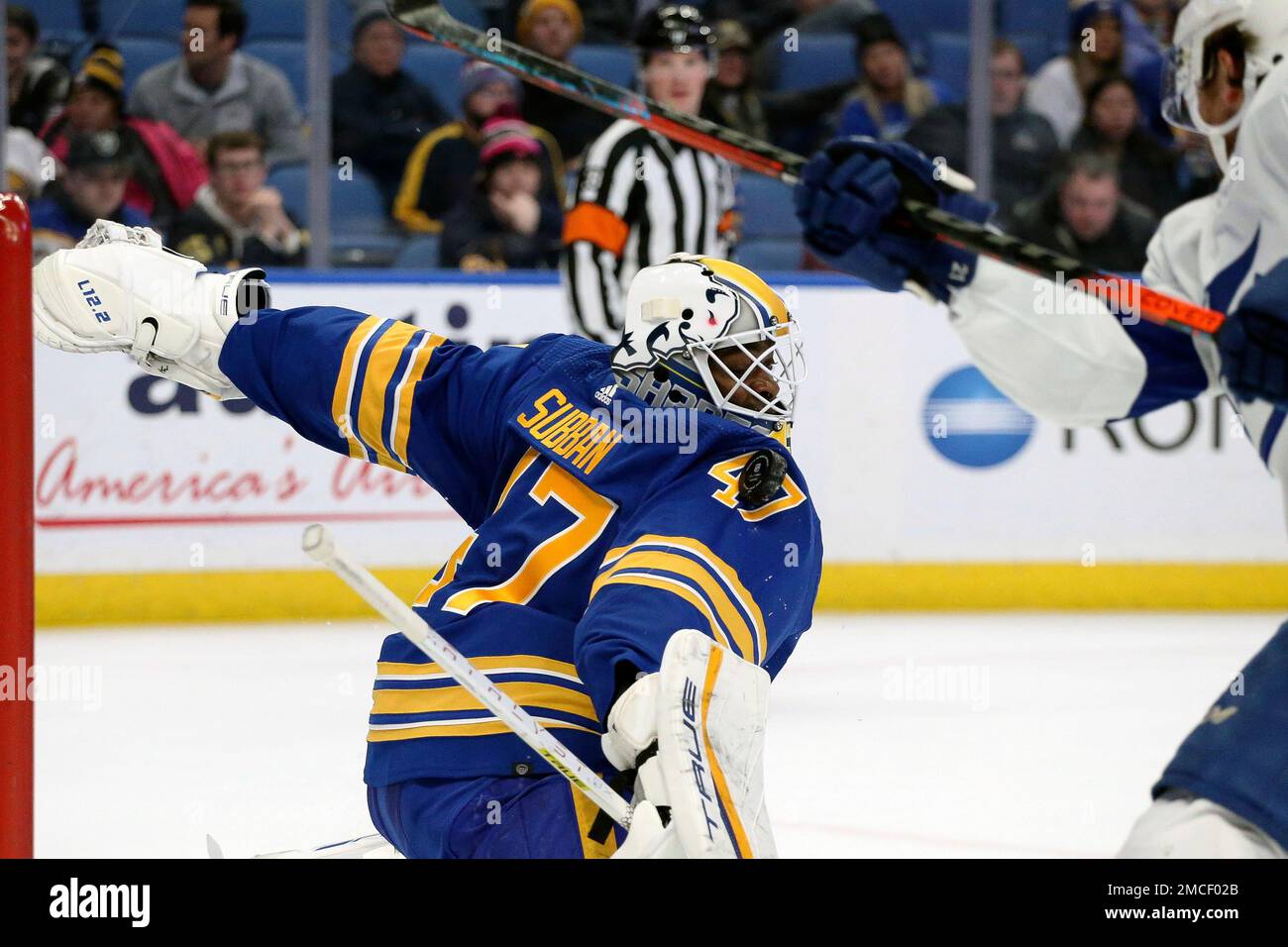 Buffalo Sabres goaltender Malcolm Subban (47) blocks a shot by Tampa ...