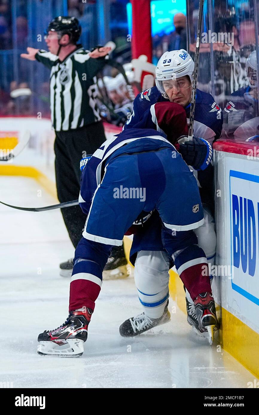 Winnipeg Jets center Mark Scheifele (55) tangles with Colorado ...