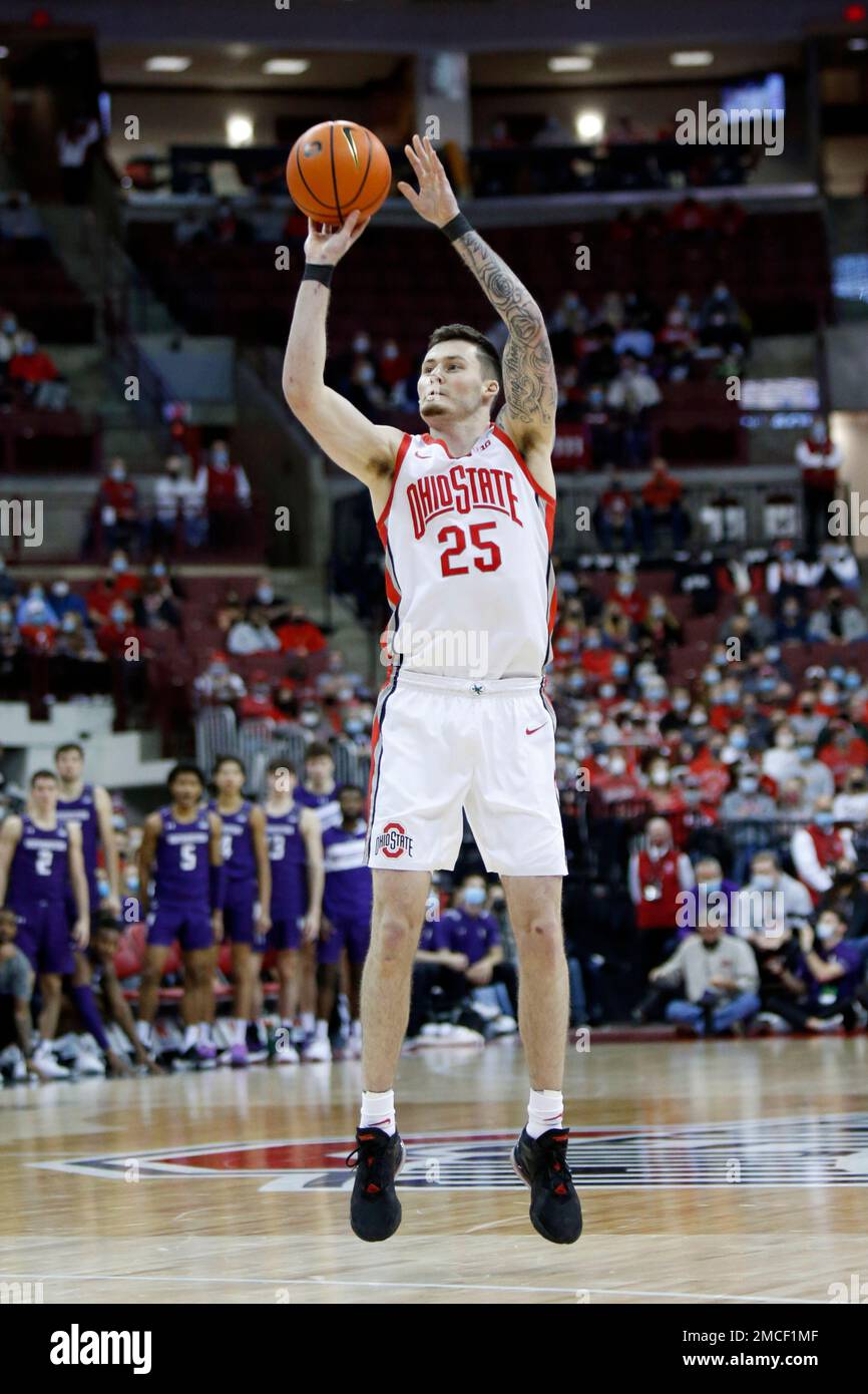 Ohio State forward Kyle Young goes up to shoot against Northwestern ...