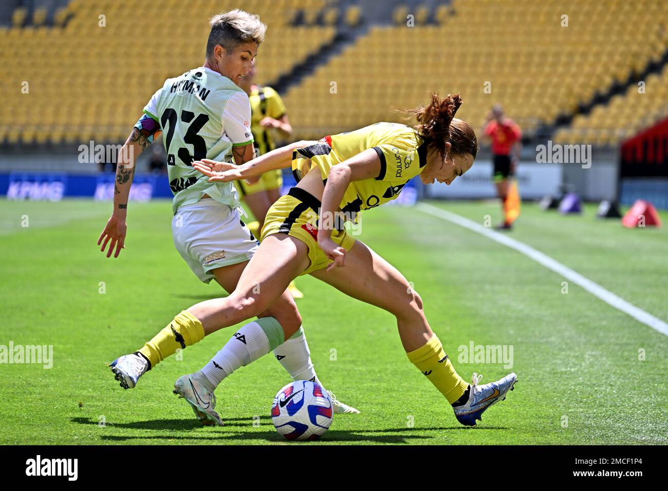 Mackenzie Barry of the Phoenix and Michelle Heyman of Canberra United ...