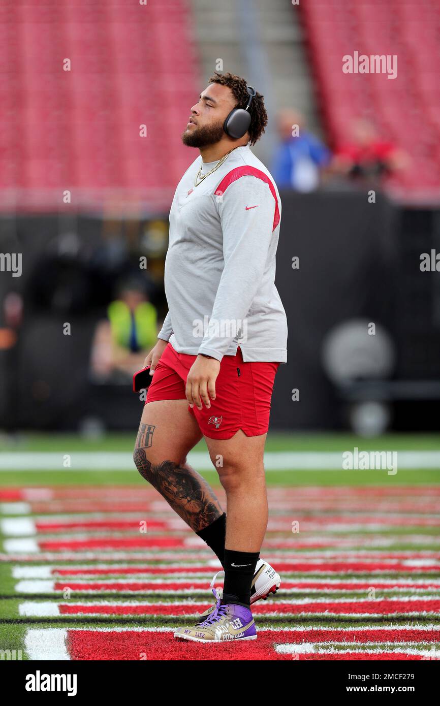 Tampa Bay Buccaneers guard Aaron Stinnie (64) warms up during a NFL ...