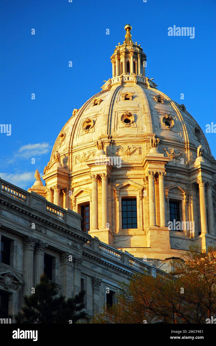 Sunlight bathes the dome of the Minneapolis State Capitol building in ...