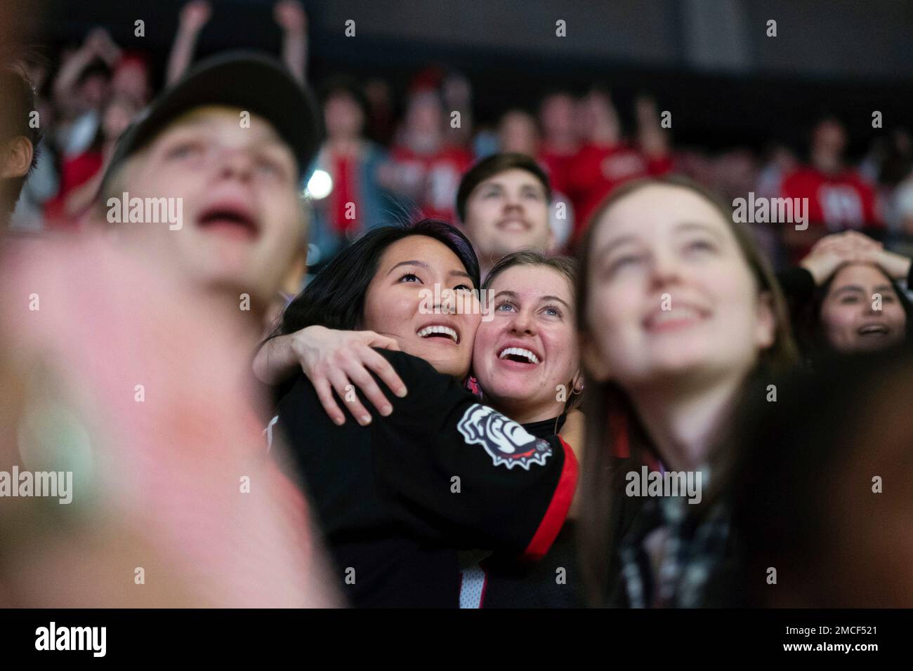 Fans celebrate at the University of Georgia's coliseum in Athens, Ga ...