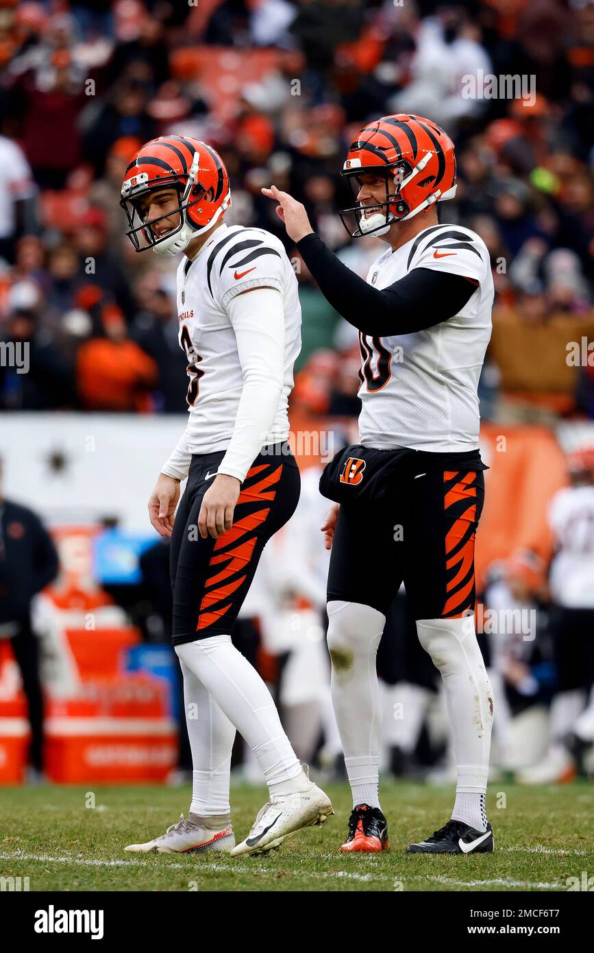 Cincinnati Bengals punter Kevin Huber (10) congratulates place kicker ...