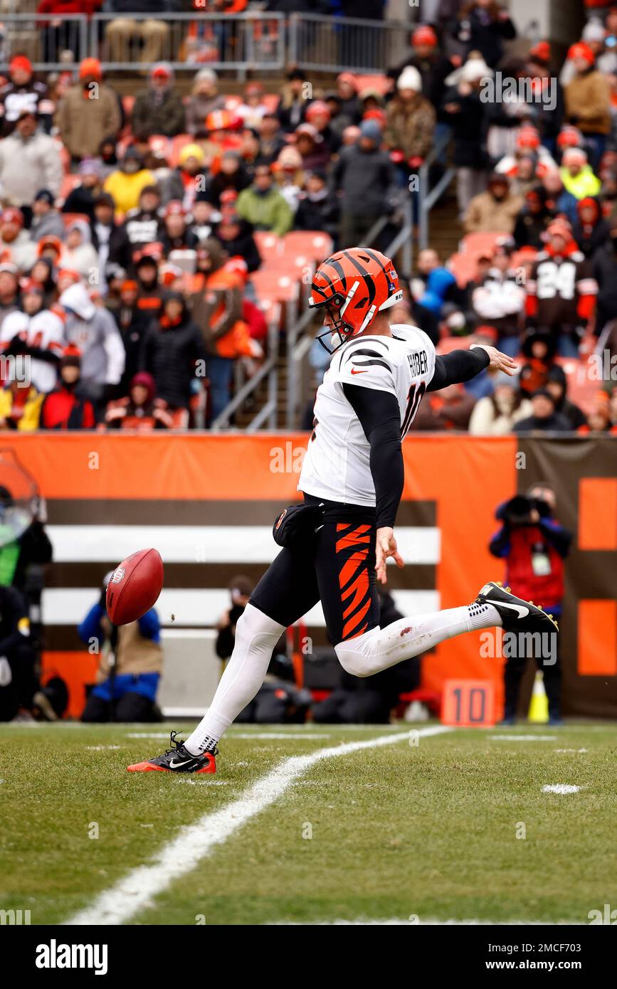 Cincinnati Bengals punter Kevin Huber (10) kicks the ball during an NFL ...