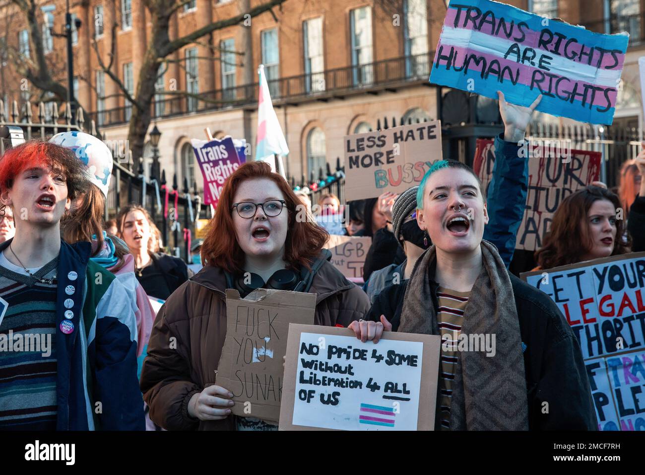 London, UK. 21 January, 2023. Trans rights activists attend a protest ...