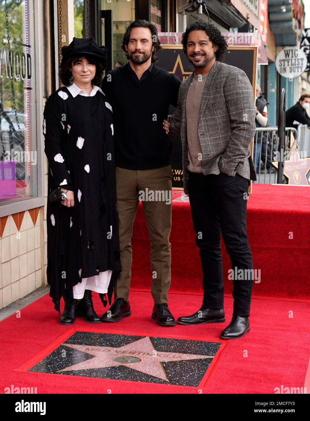 Actor Milo Ventimiglia, center, poses with guest speakers Amy Sherman ...