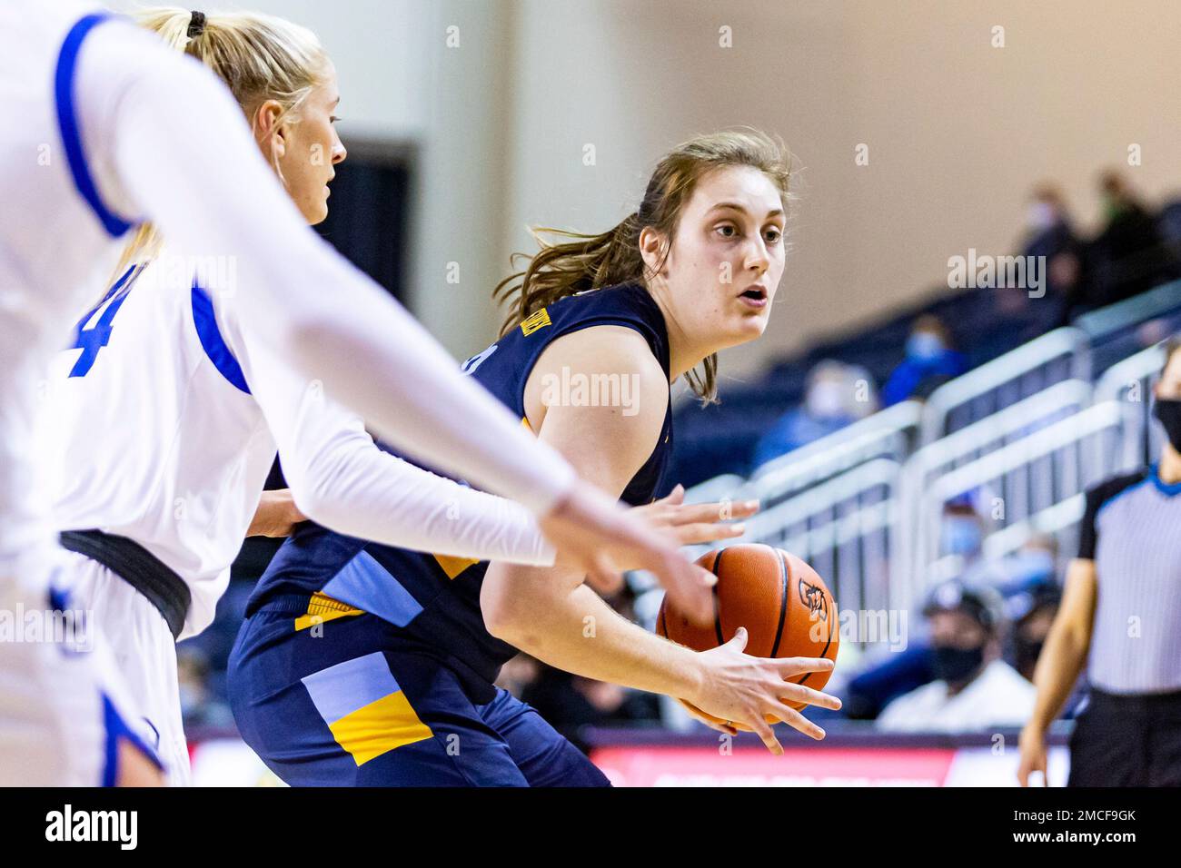 Marquette forward Lauren Van Kleunen (42) dribbles the ball against ...