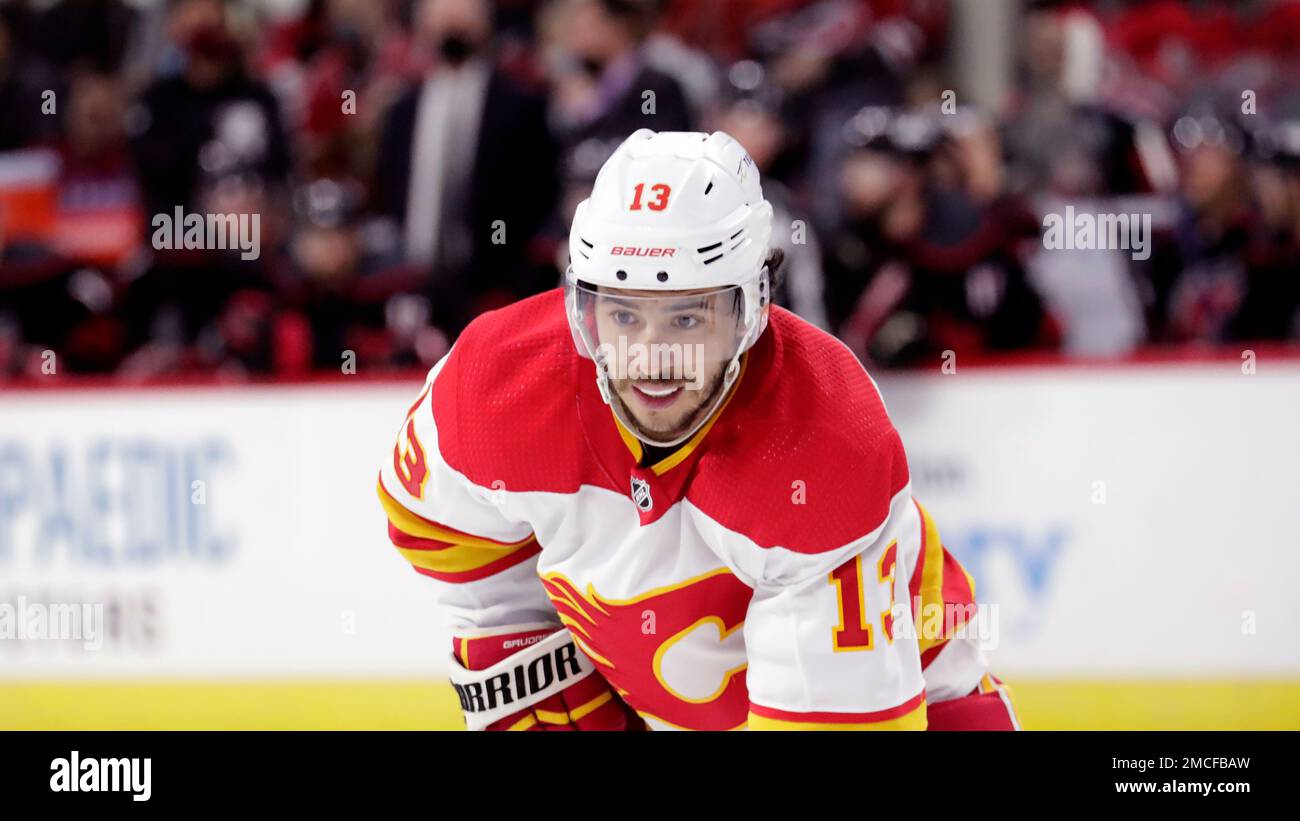 Calgary Flames left wing Johnny Gaudreau (13) waits for a face-off ...