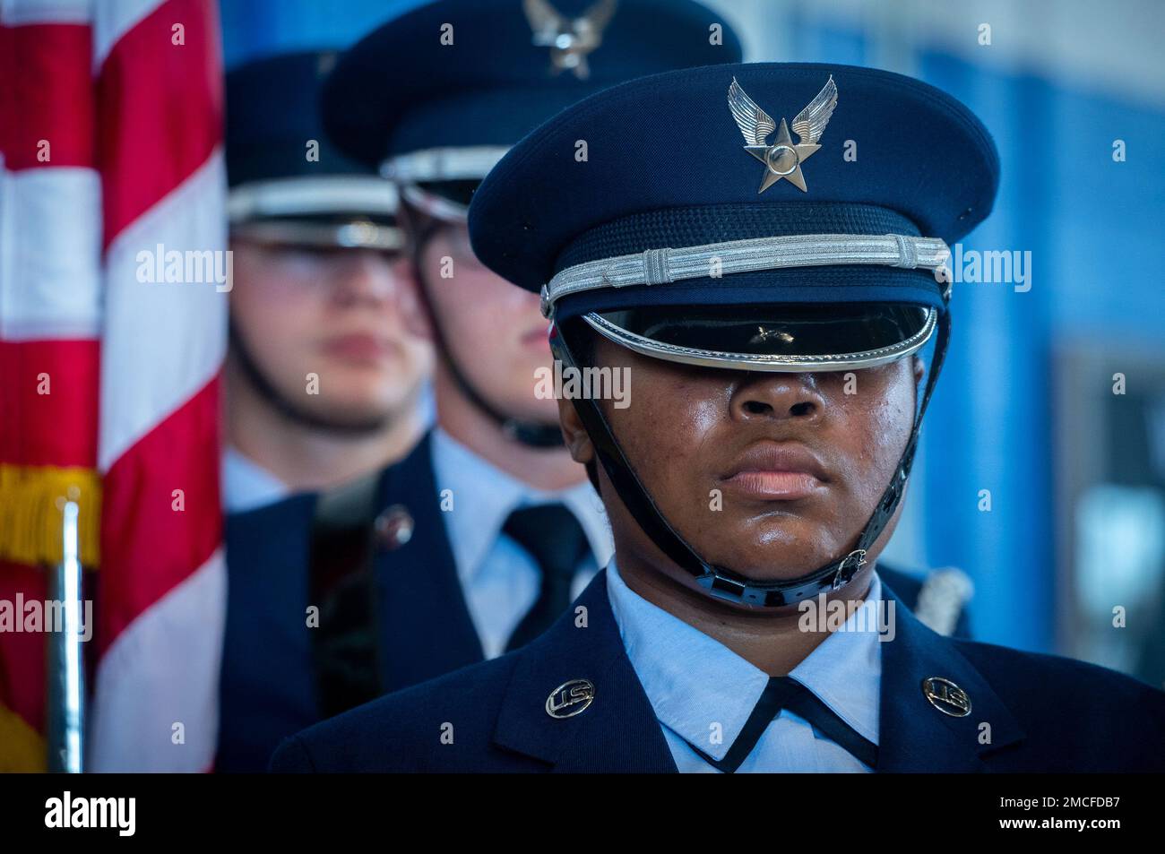 Eglin honor guard members stand ready to bring in the colors during the ...