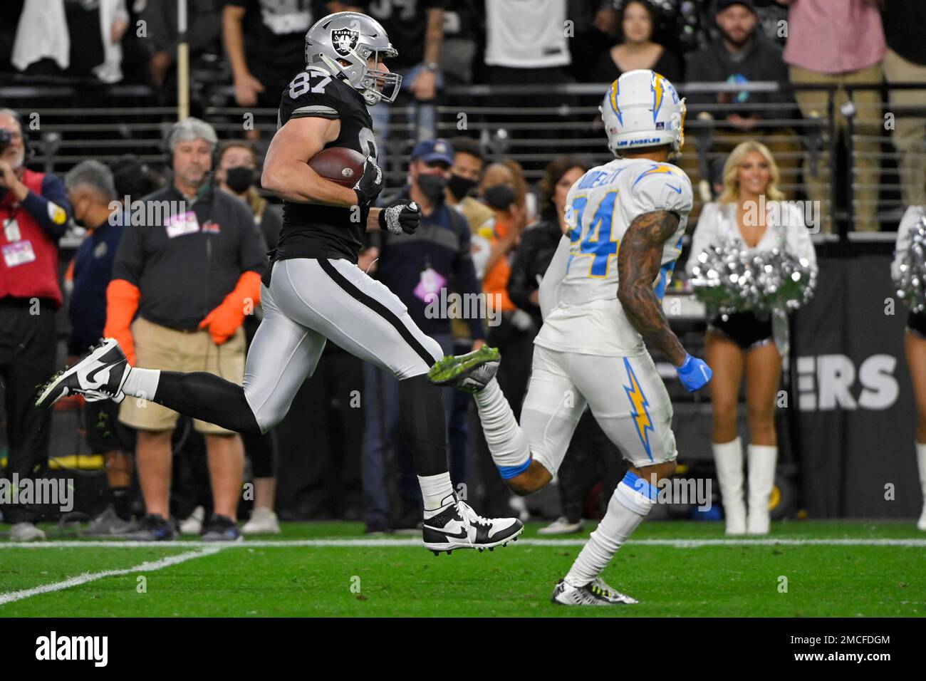Las Vegas Raiders tight end Foster Moreau (87) runs after making a ...