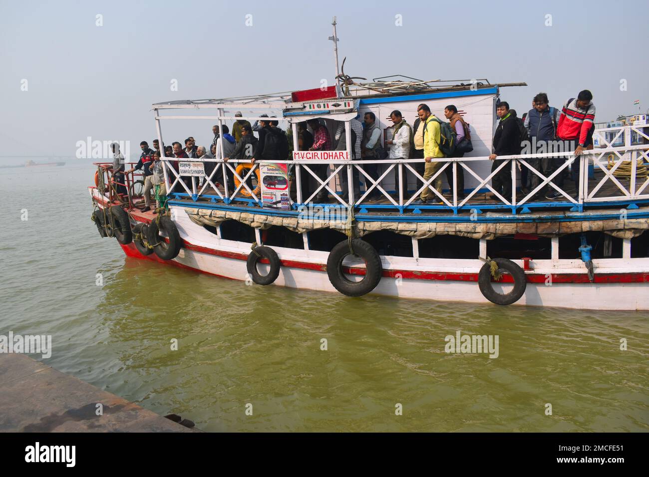 Kolkata, India. 21st Jan, 2023. People are traveling on the water ...