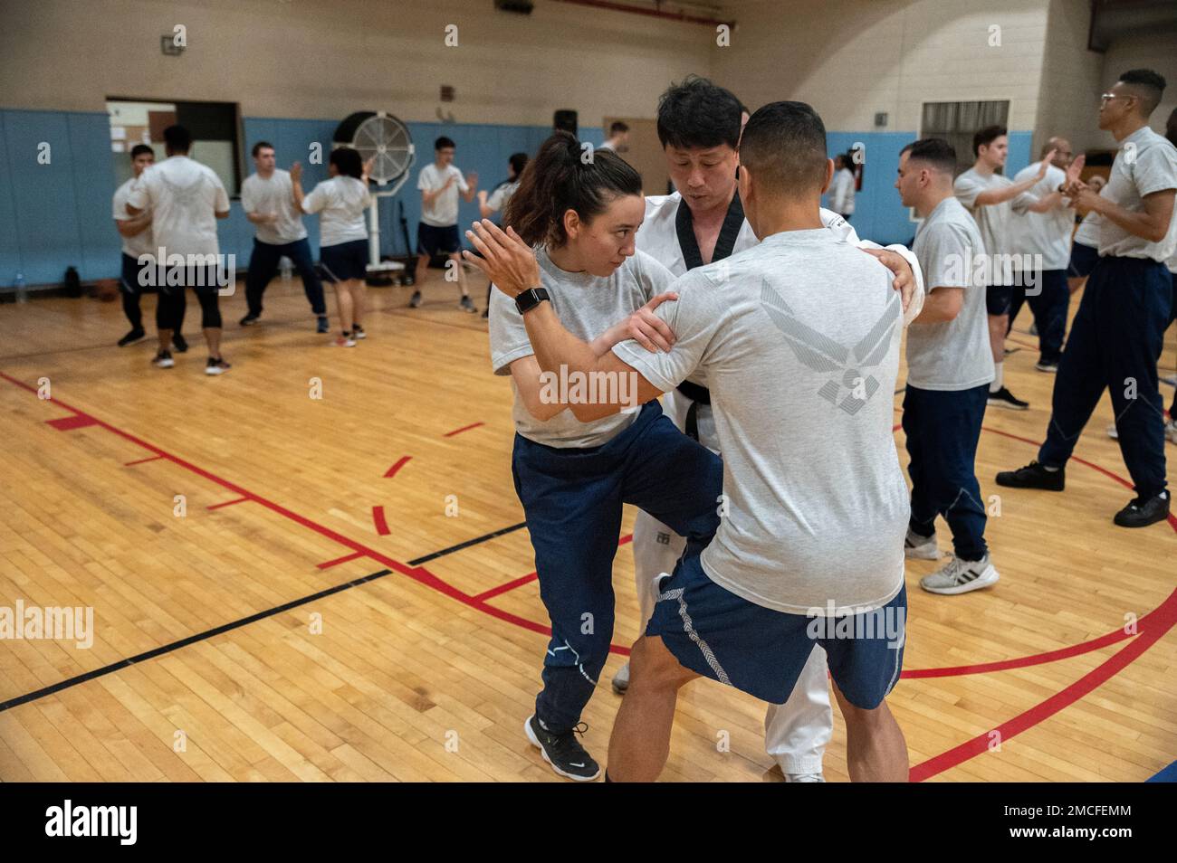 Airmen from the 51st Mission Support Group are guided by Master Doyoung ...