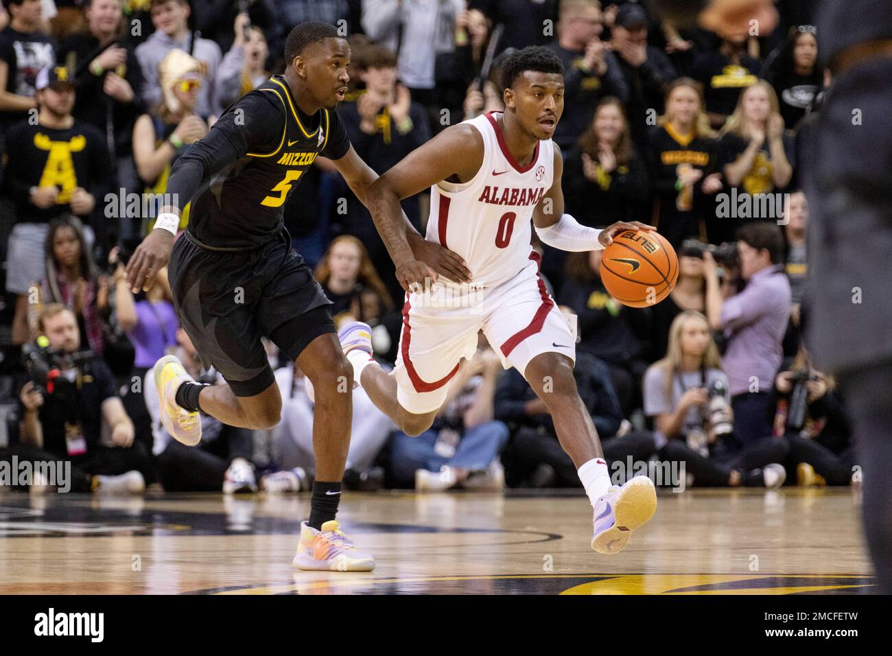 Alabama's Jaden Bradley, right, drives past Missouri's D'Moi Hodge ...