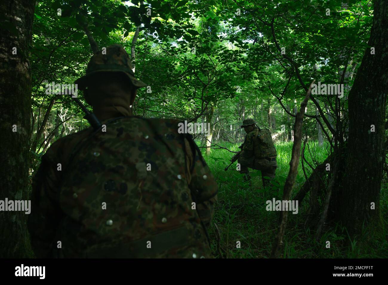 U.S. Marine Corps Capt. Mark Deal, a company commander, and Sgt. Juan ...