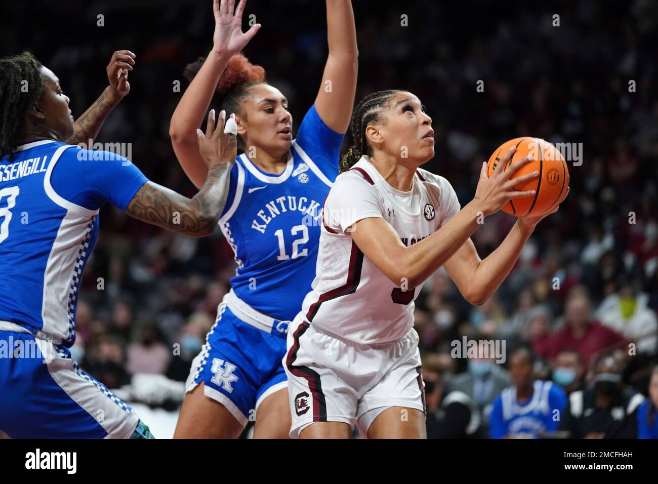 South Carolina forward Victaria Saxton, right, drives to the hoop ...