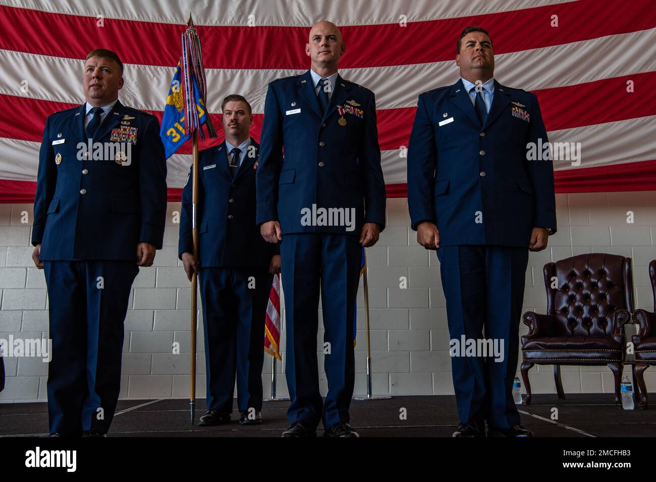 Col. John Poole, 317th Operations Group commander, Lt. Col. Brenton Gaylord, outgoing 317th ...