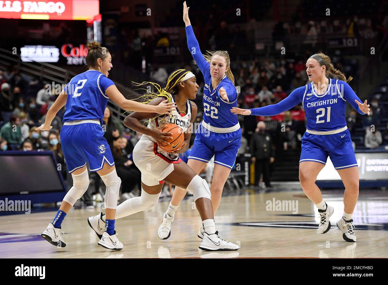 Connecticut's Aaliyah Edwards (3) is pressured by Creighton's Tatum ...