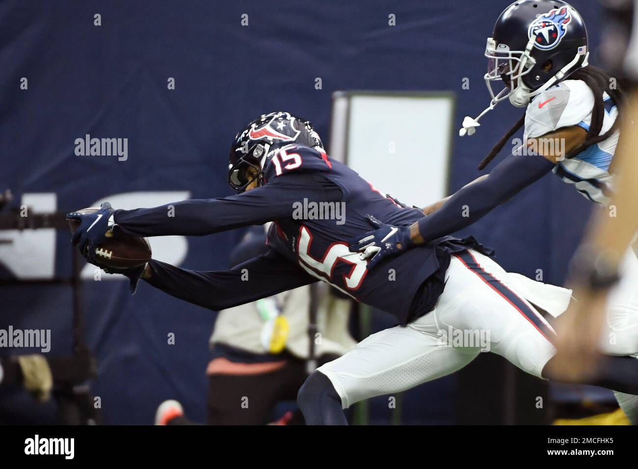 Houston Texans wide receiver Chris Moore (15) scores a touchdown past ...