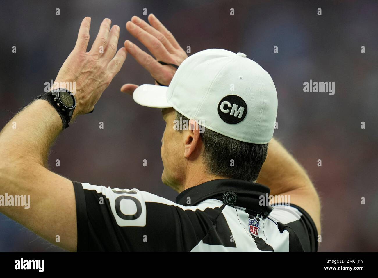 Referee Land Clark (130) wears a 'CM' patch as a tribute to former ...