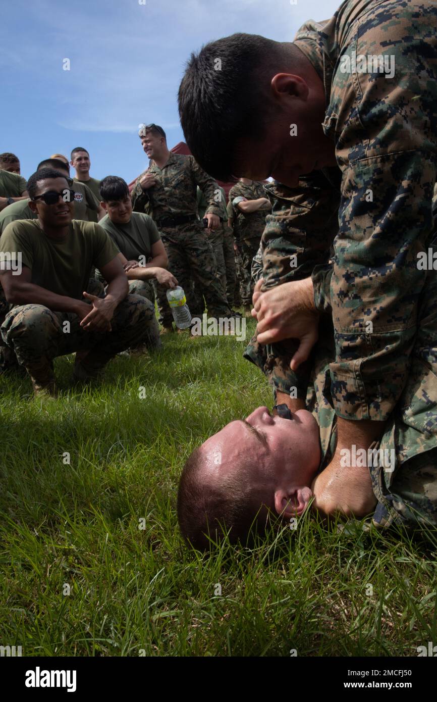 U.S. Marine 1st Lt. Cole Patton (bottom) and 1st Lt. Alexander Vergara ...