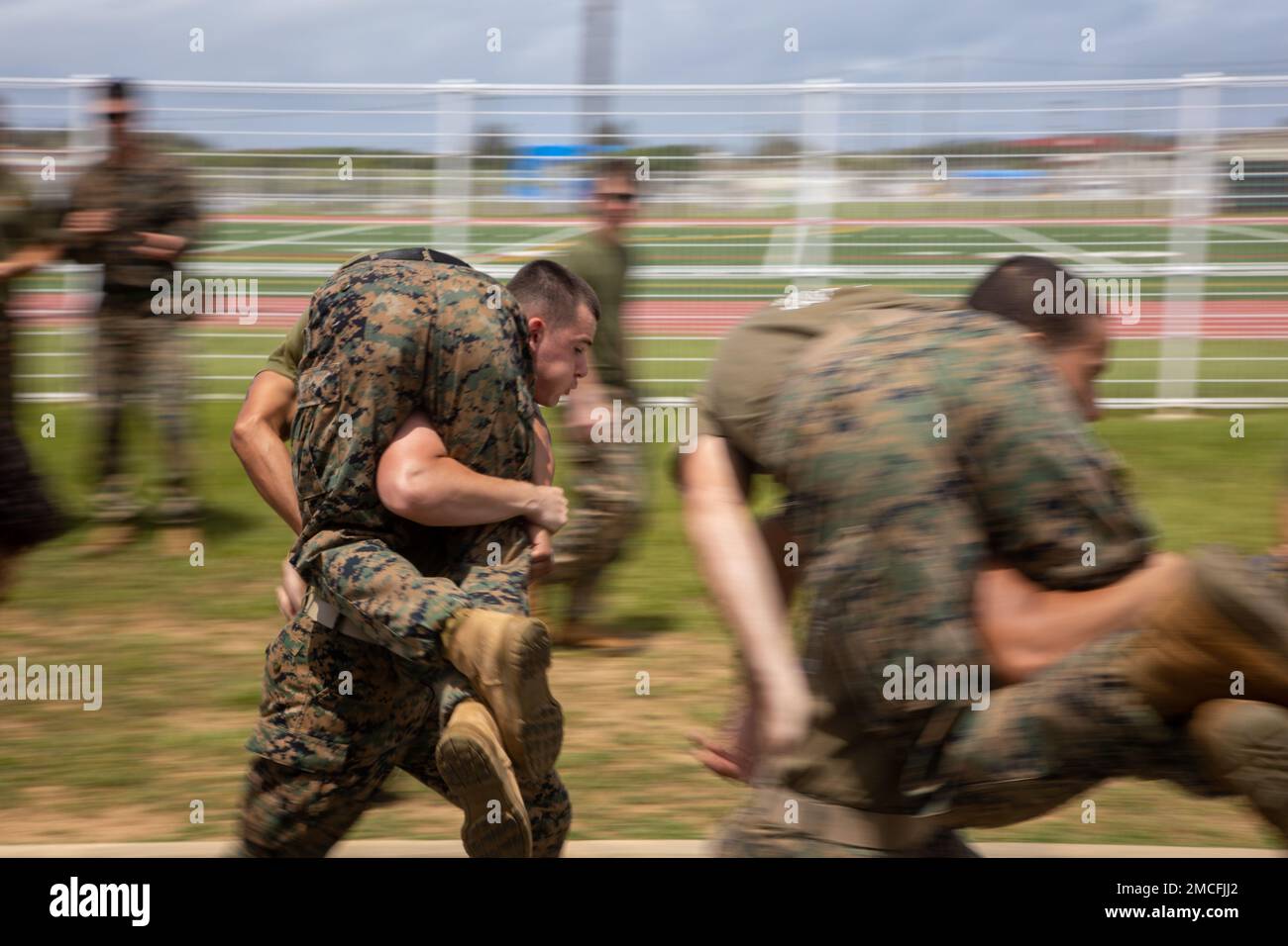 U.S. Marines with 3d Battalion, 3d Marines conduct buddy carries during ...