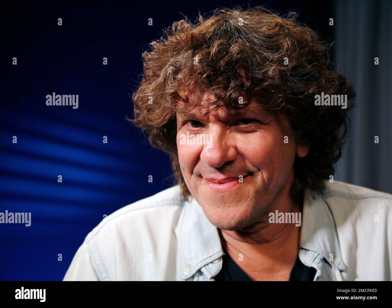 FILE - In this Aug. 13, 2009 file photo, producer Michael Lang poses ...