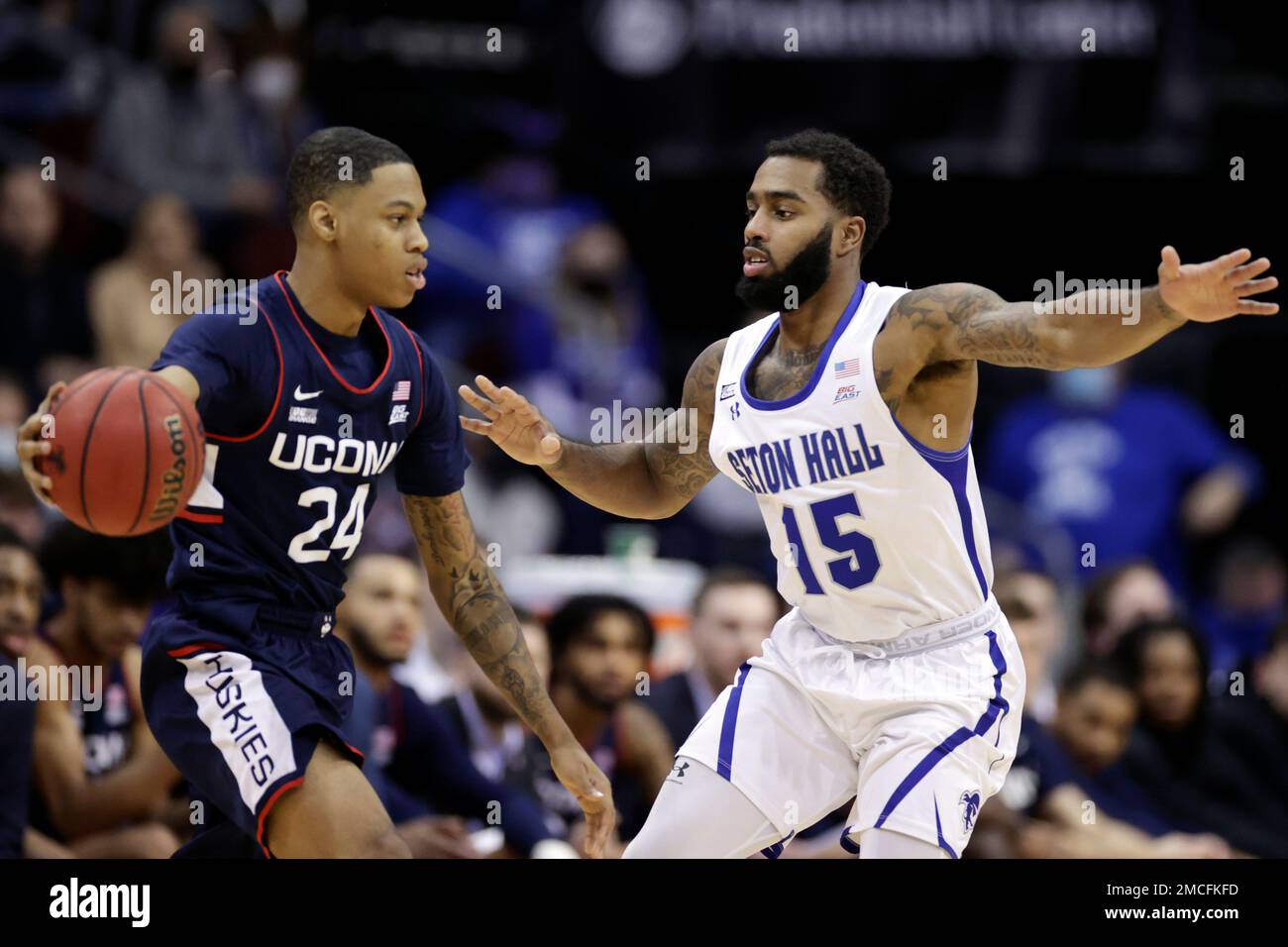 Seton Hall guard Jamir Harris (15) defends Connecticut guard Jordan ...