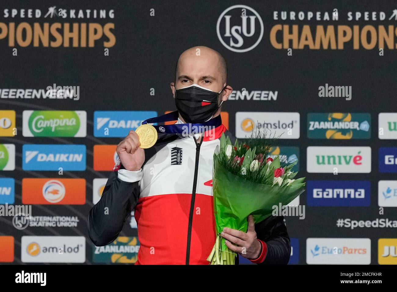 Poland's Piotr Michalski shows his gold medal after winning the men's ...