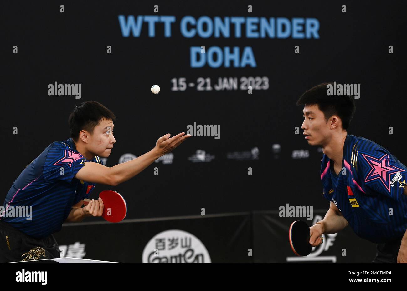 Doha, Qatar. 21st Jan, 2023. Yu Ziyang (L)/Zhou Kai of China compete ...