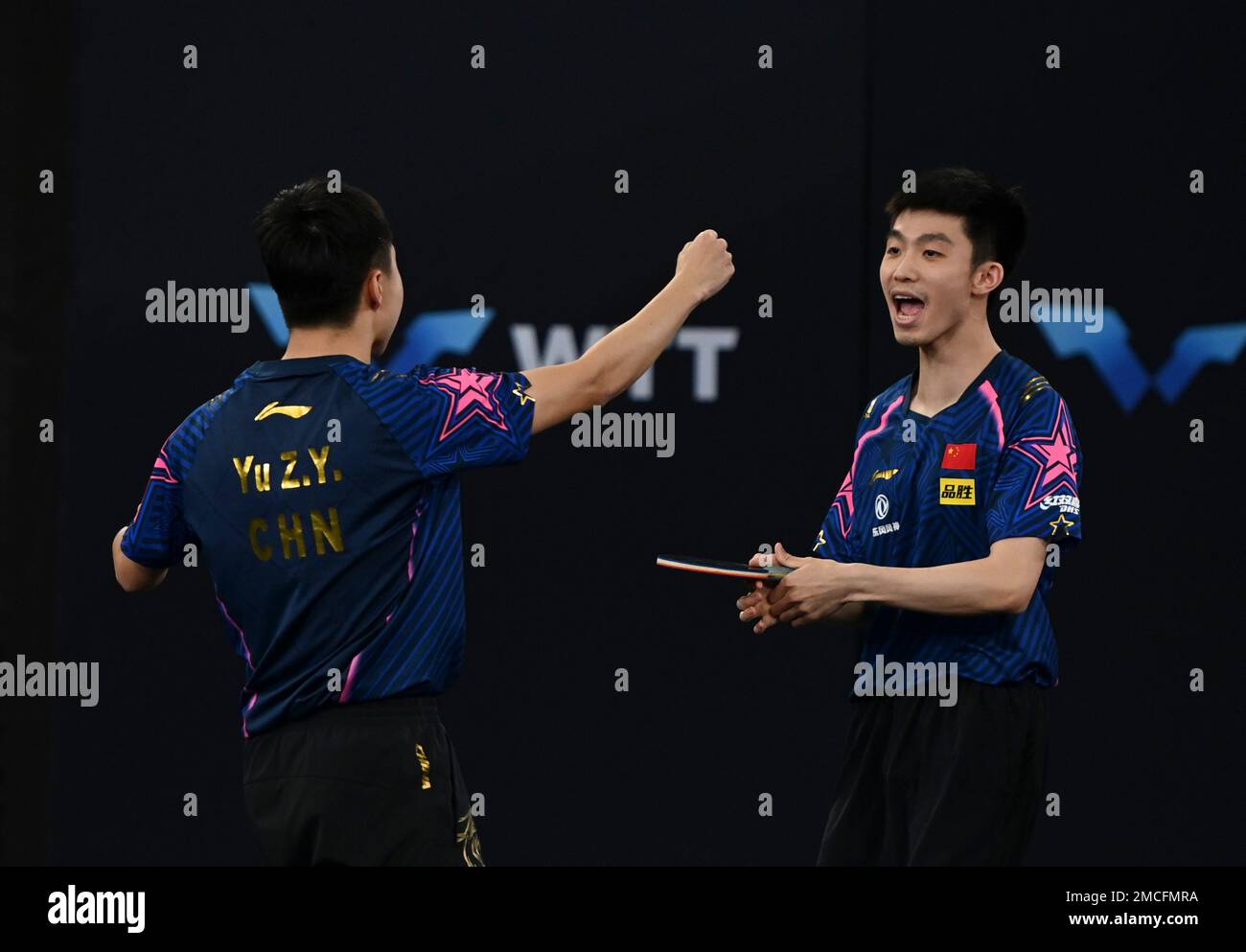 Doha, Qatar. 21st Jan, 2023. Yu Ziyang/Zhou Kai (R) of China celebrate ...