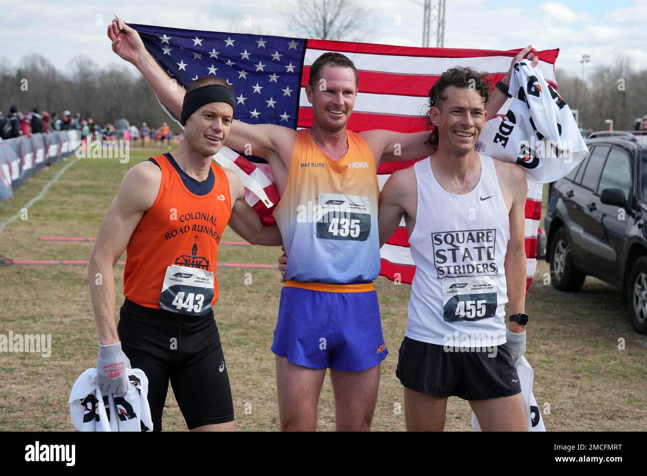 Masters Men's winner Ben Bruce aka Benjamin Bruce (center) poses with ...