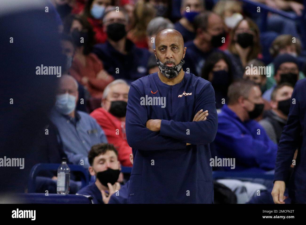 Pepperdine head coach Lorenzo Romar watches the second half of an NCAA ...