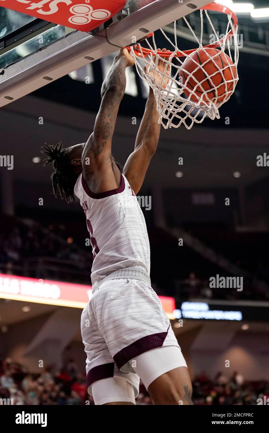 Texas A&M guard Quenton Jackson (3) dunks the ball against Arkansas ...