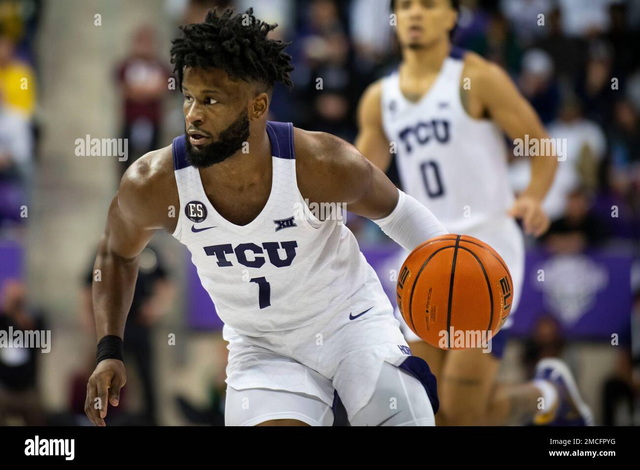 TCU guard Mike Miles (1) dribble the ball up the floor in the second ...
